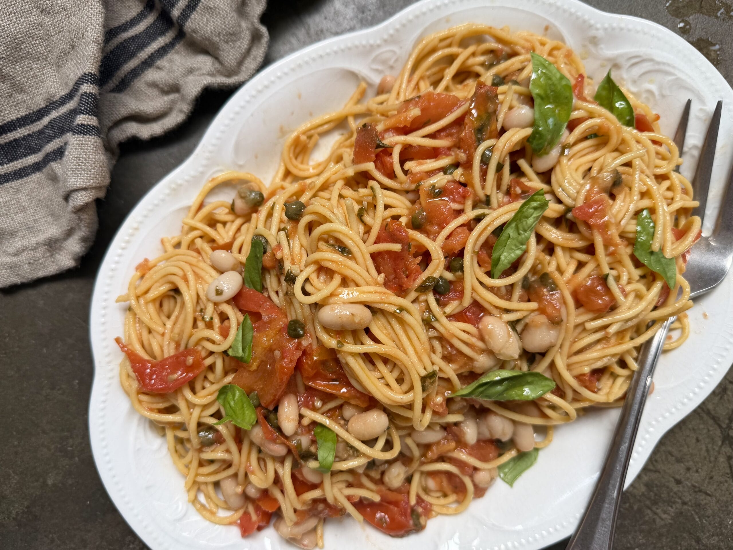 Spaghetti with Roasted and Smashed Tomato Sauce and White Beans